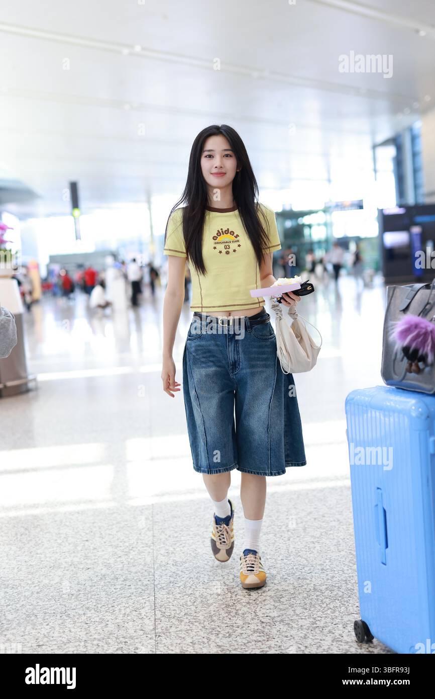 Chinese actress He Qiu appears at the airport in Shanghai, China, 30 ...