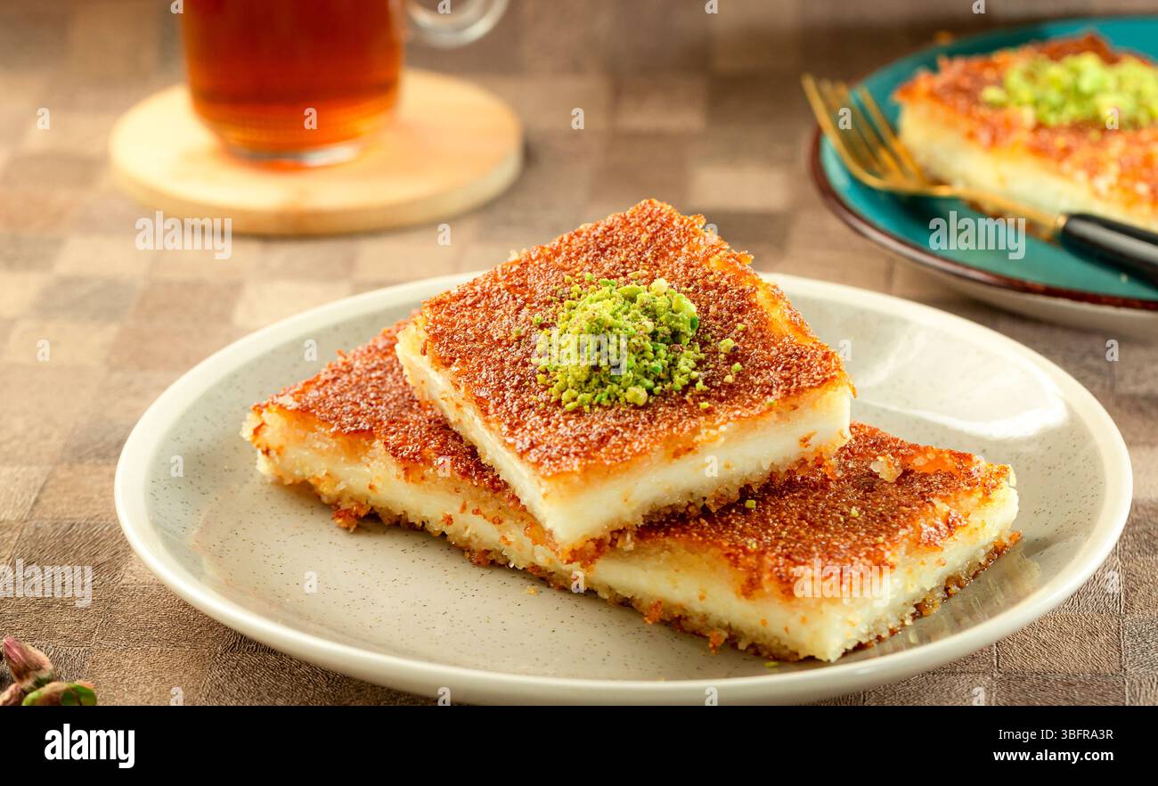 Basbousa with cream, traditional Middle Eastern semolina dessert Stock ...