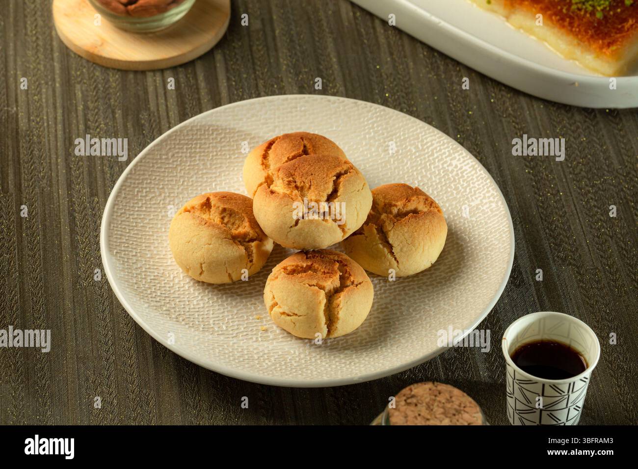 Plate of Ghraybeh cookies, classic Arabic shortbread made with ghee and ...