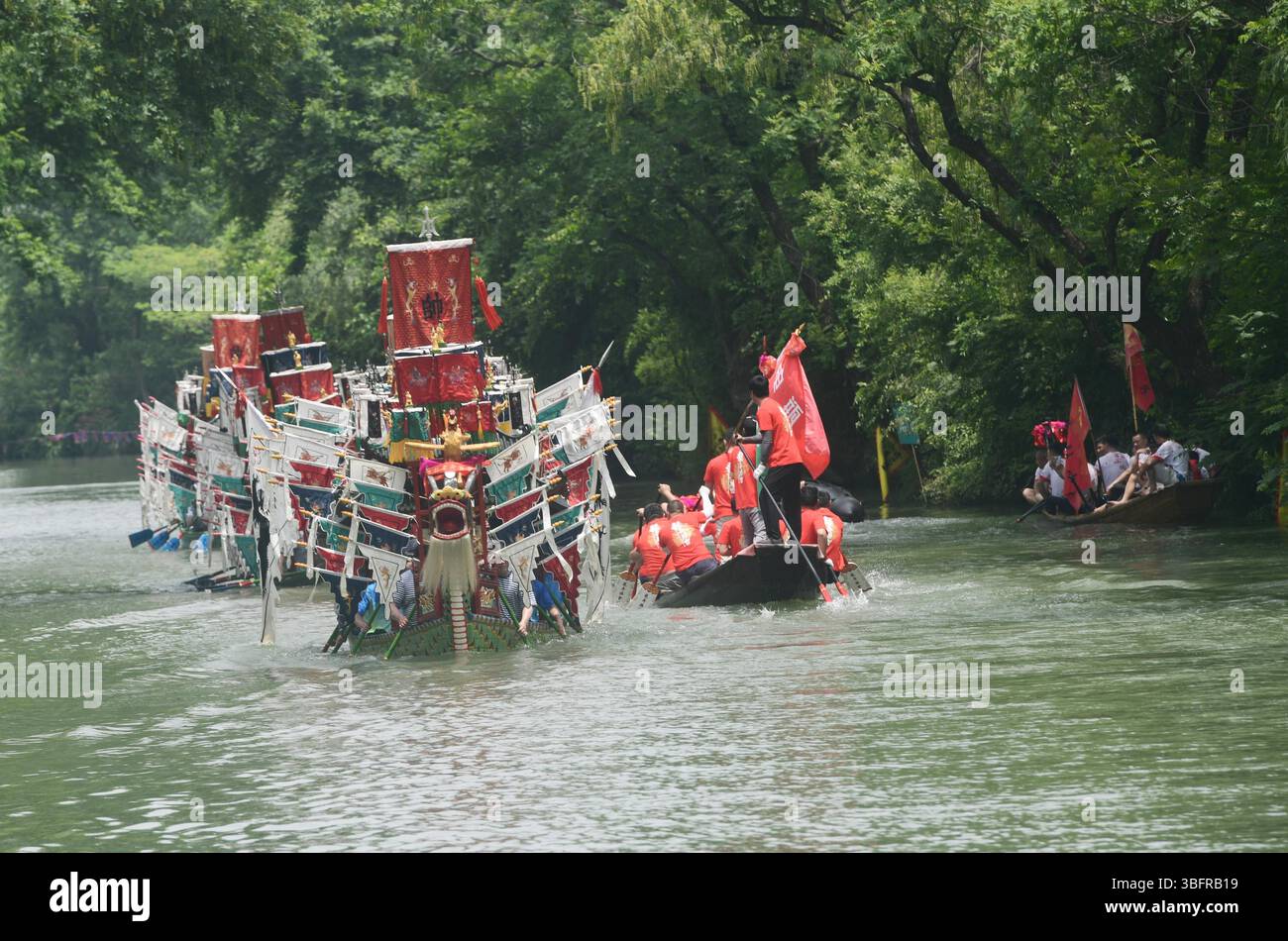 Dragon boats shuttle at Xixi Wetland in Hangzhou City, east China's ...