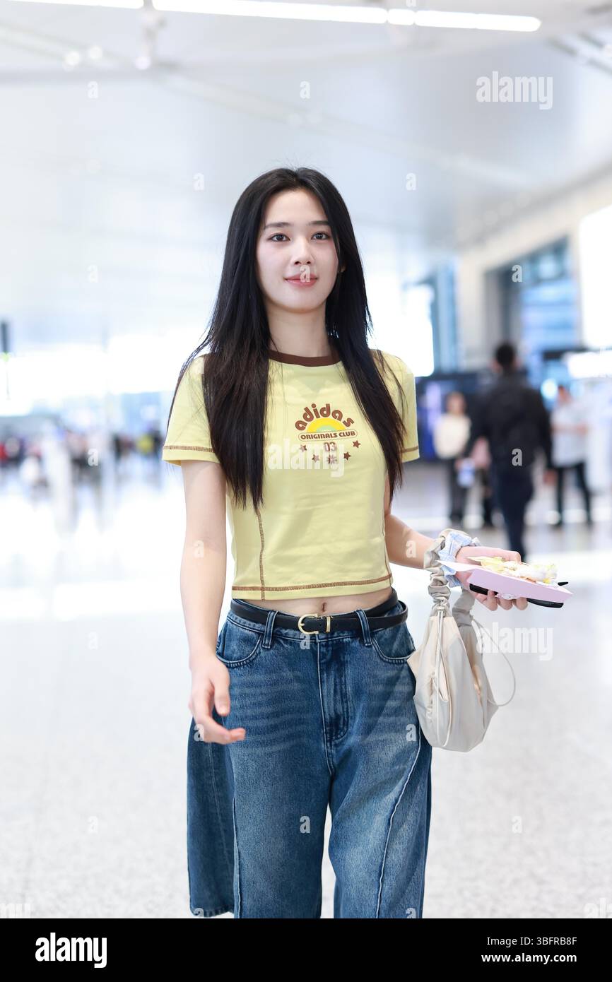 Chinese actress He Qiu appears at the airport in Shanghai, China. 30th ...