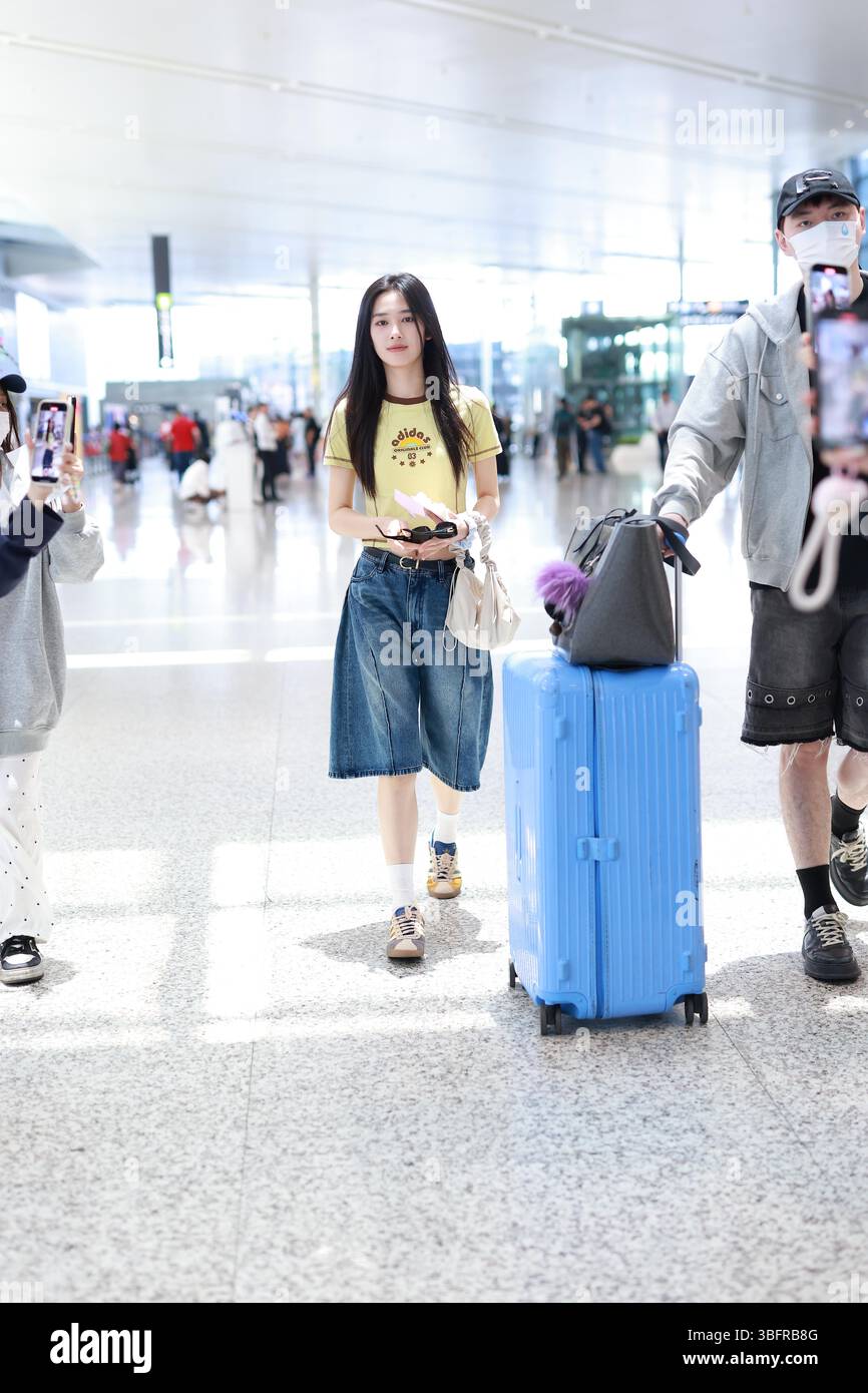 Chinese actress He Qiu appears at the airport in Shanghai, China. 30th ...