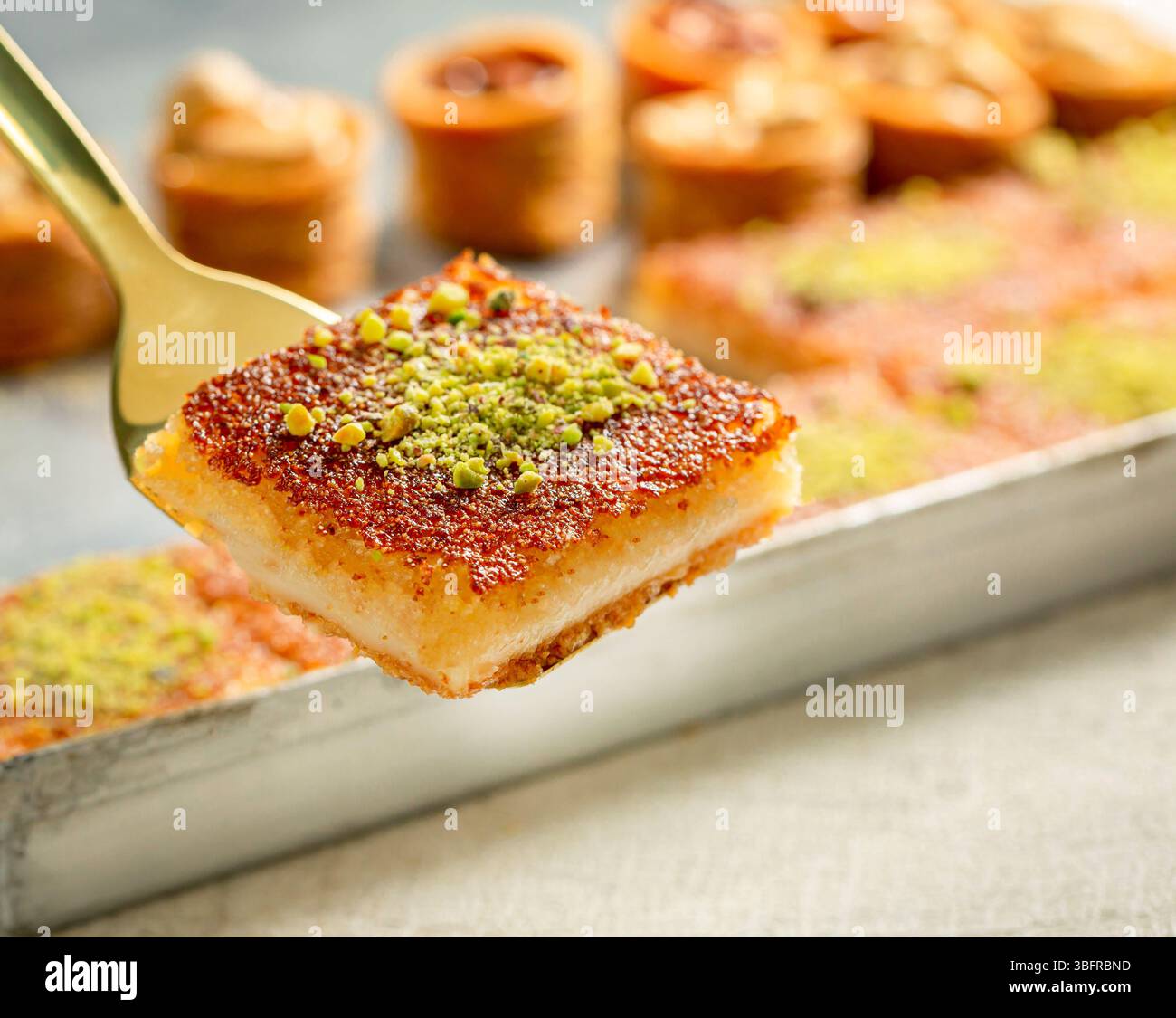 Basbousa with cream, iconic Middle Eastern dessert made from semolina ...