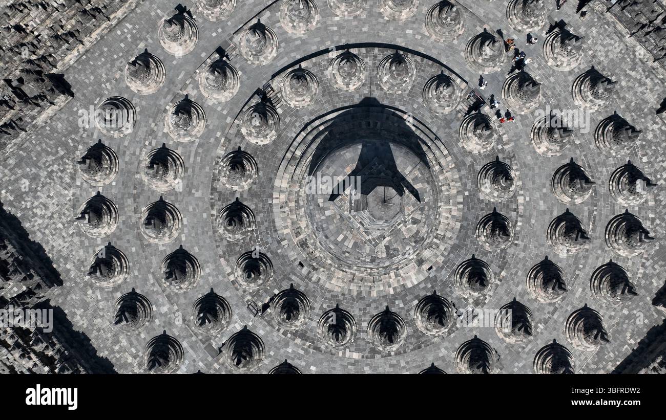 Marvel at the perfect alignment of Borobudur stupas in this stunning ...