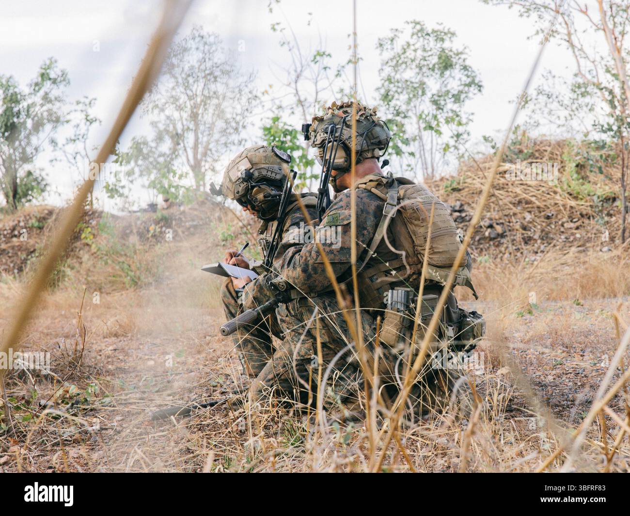 U.S. Marine Corps Staff Sgt. Gabriel Charriez (left), a platoon ...