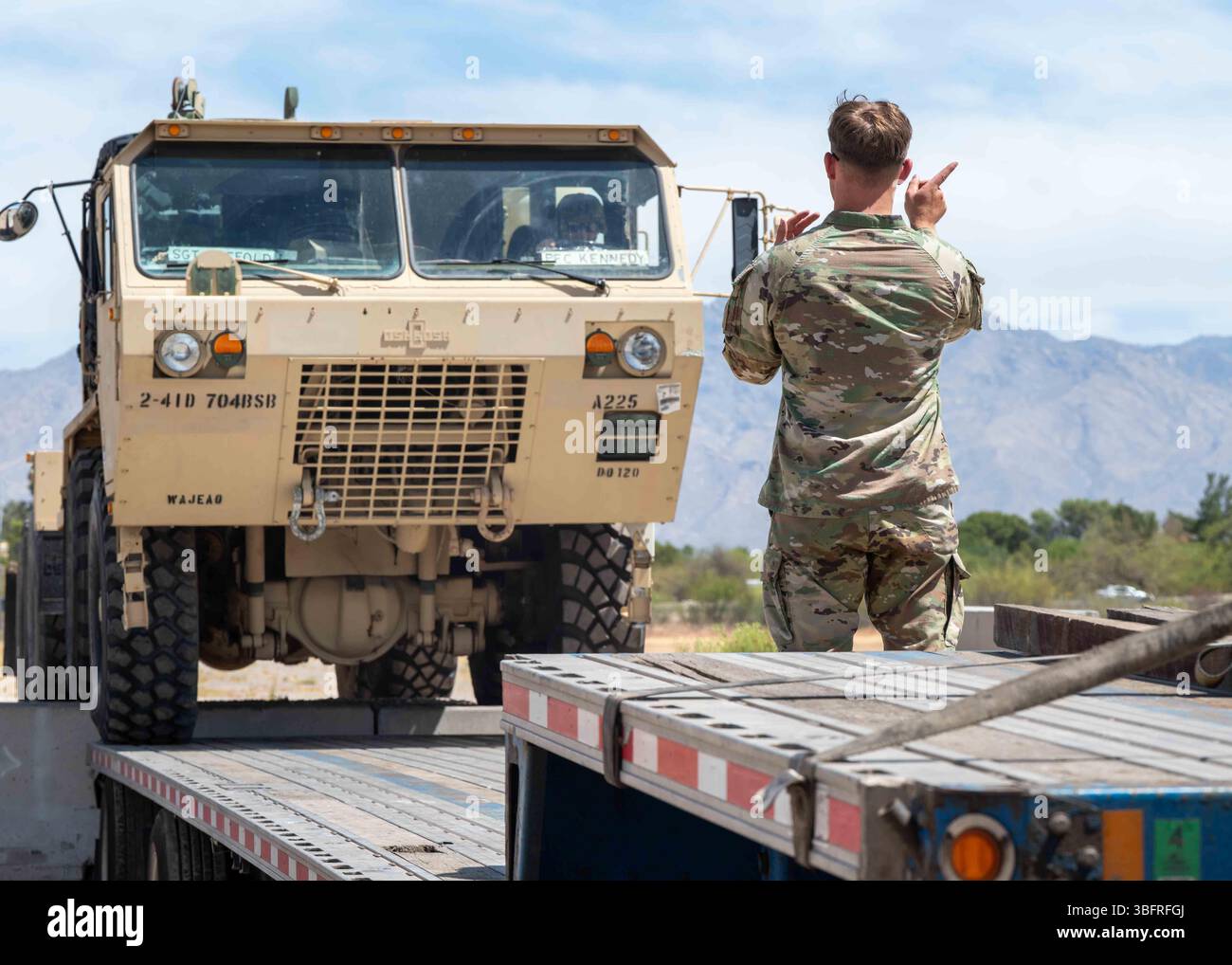Soldier guides armored vehicle hi-res stock photography and images - Alamy