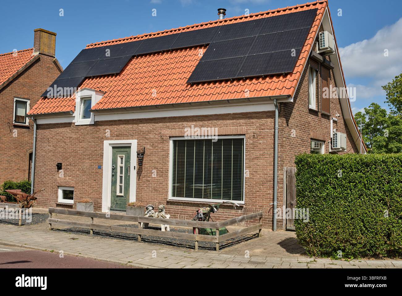 May 22, 2025 - Oosterland-Netherlands: Traditional Dutch brick house ...
