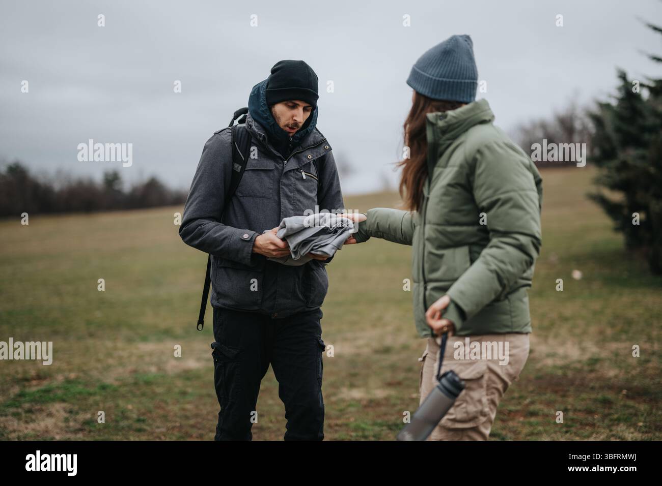 Two Friends Interacting Outdoors in a Natural Landscape Stock Photo - Alamy