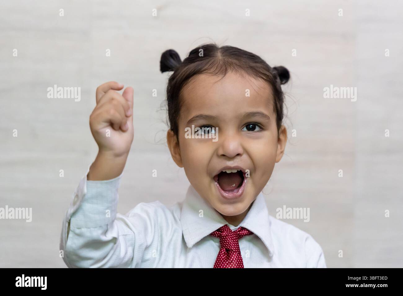 indian kid cute facial expression in shirt at indoor Stock Photo - Alamy