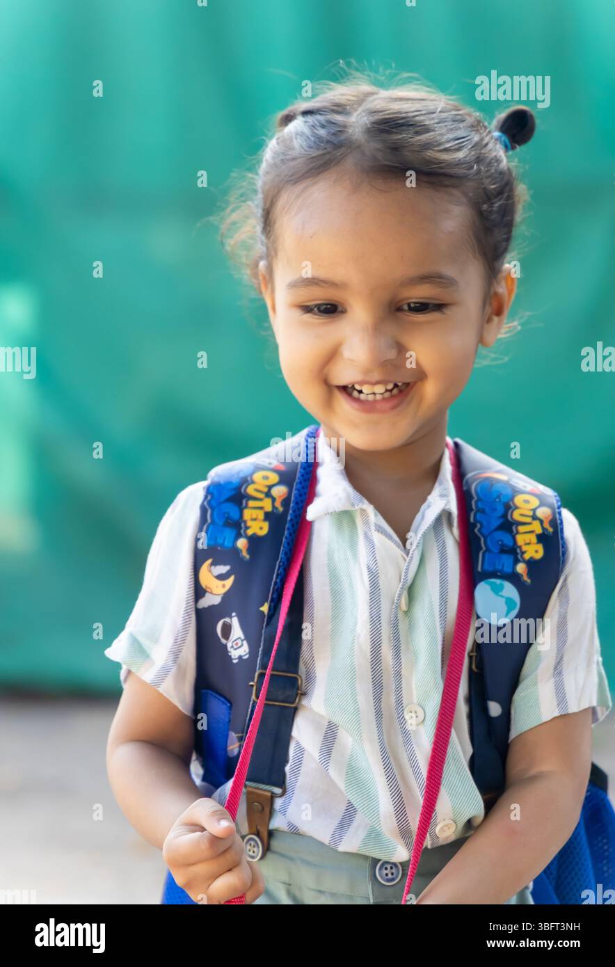 indian kid cute expression with beg for first day of school at sunny ...