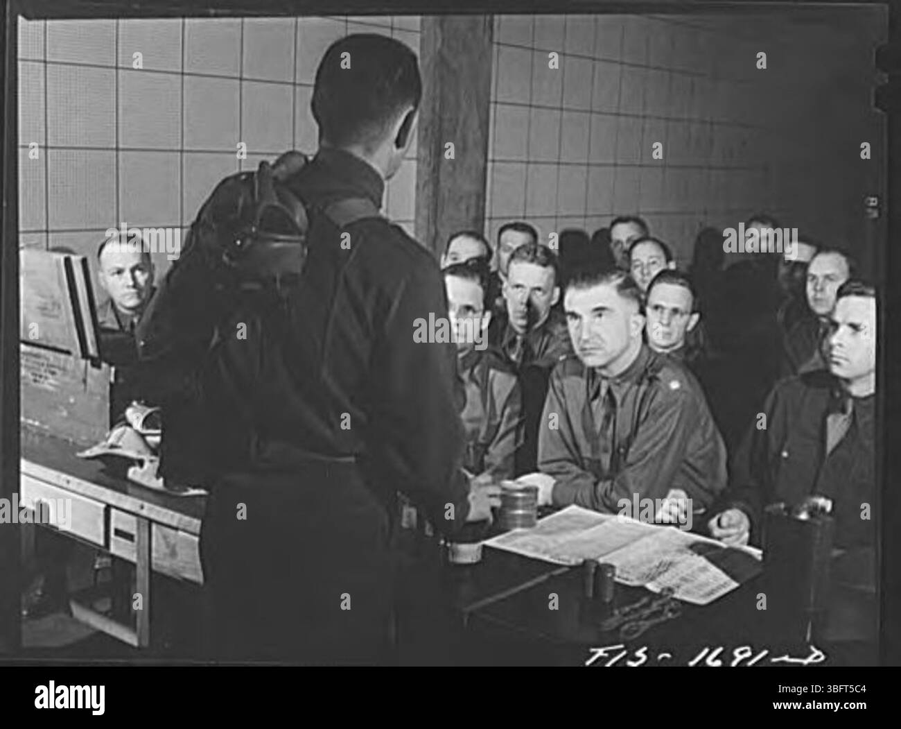Captain William W. Kitchen is shown instructing a U.S. Army Chaplain ...