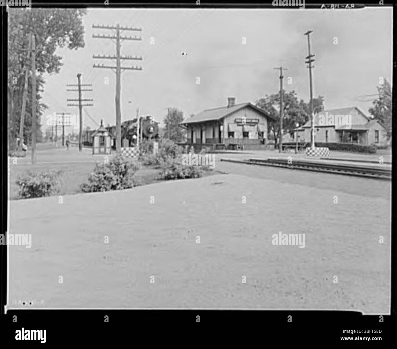 The image shows the intersection of the Erie Railroad tracks and U.S ...