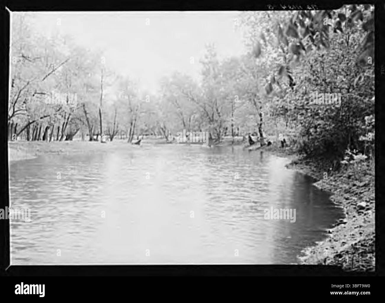 This image shows a river in a National Park that was once a marsh. The ...