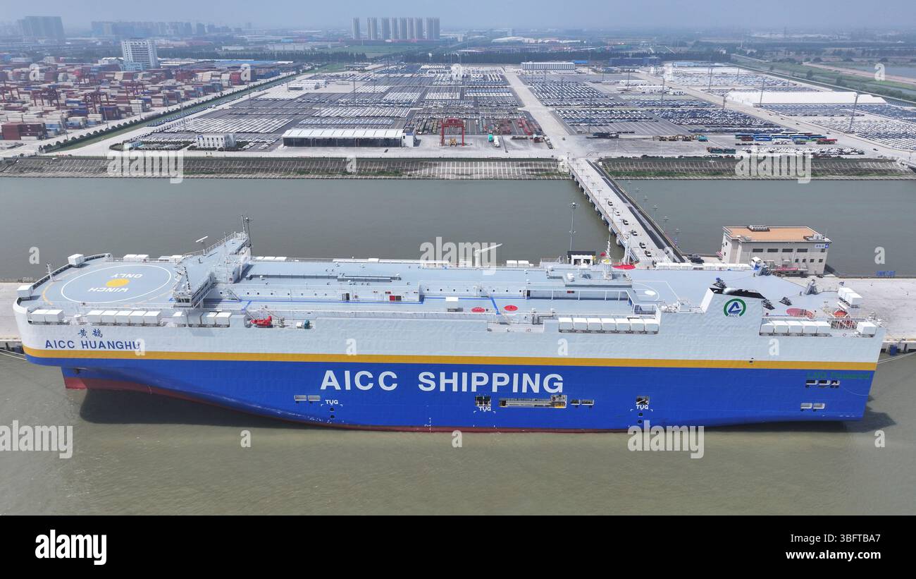 SUZHOU, CHINA - JUNE 3, 2025 - A cargo ship load automobiles for export ...