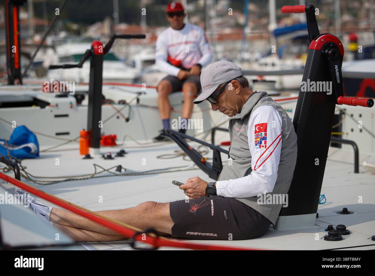 A man prepares for competition during the first day of the 52 Super ...