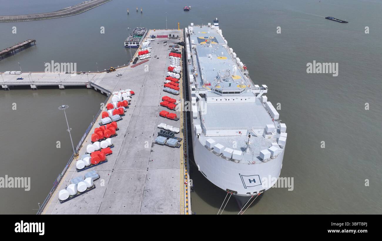 SUZHOU, CHINA - JUNE 3, 2025 - A cargo ship load automobiles for export ...