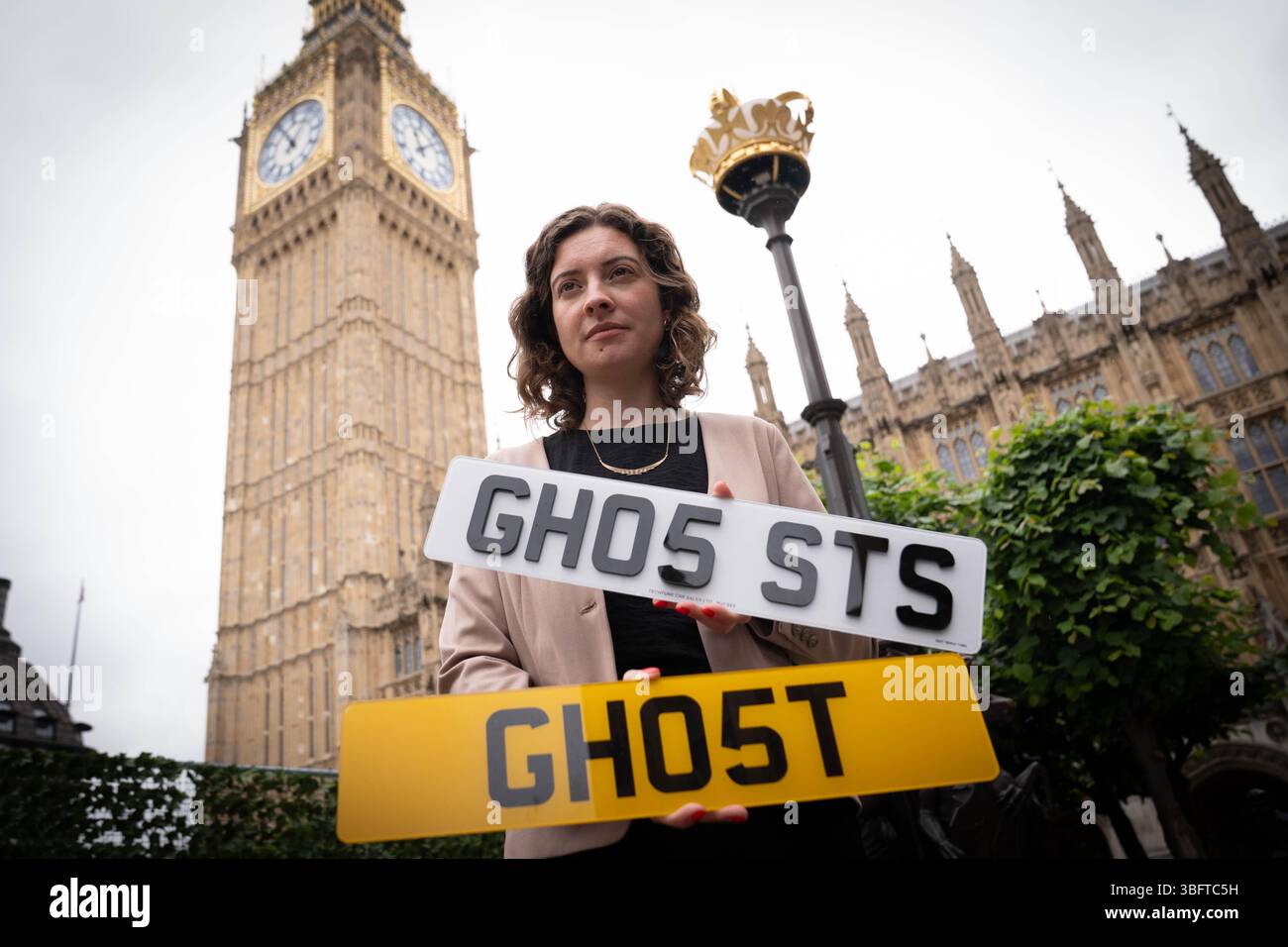 Sarah Coombes, Labour MP for West Bromwich, holding vehicle number ...