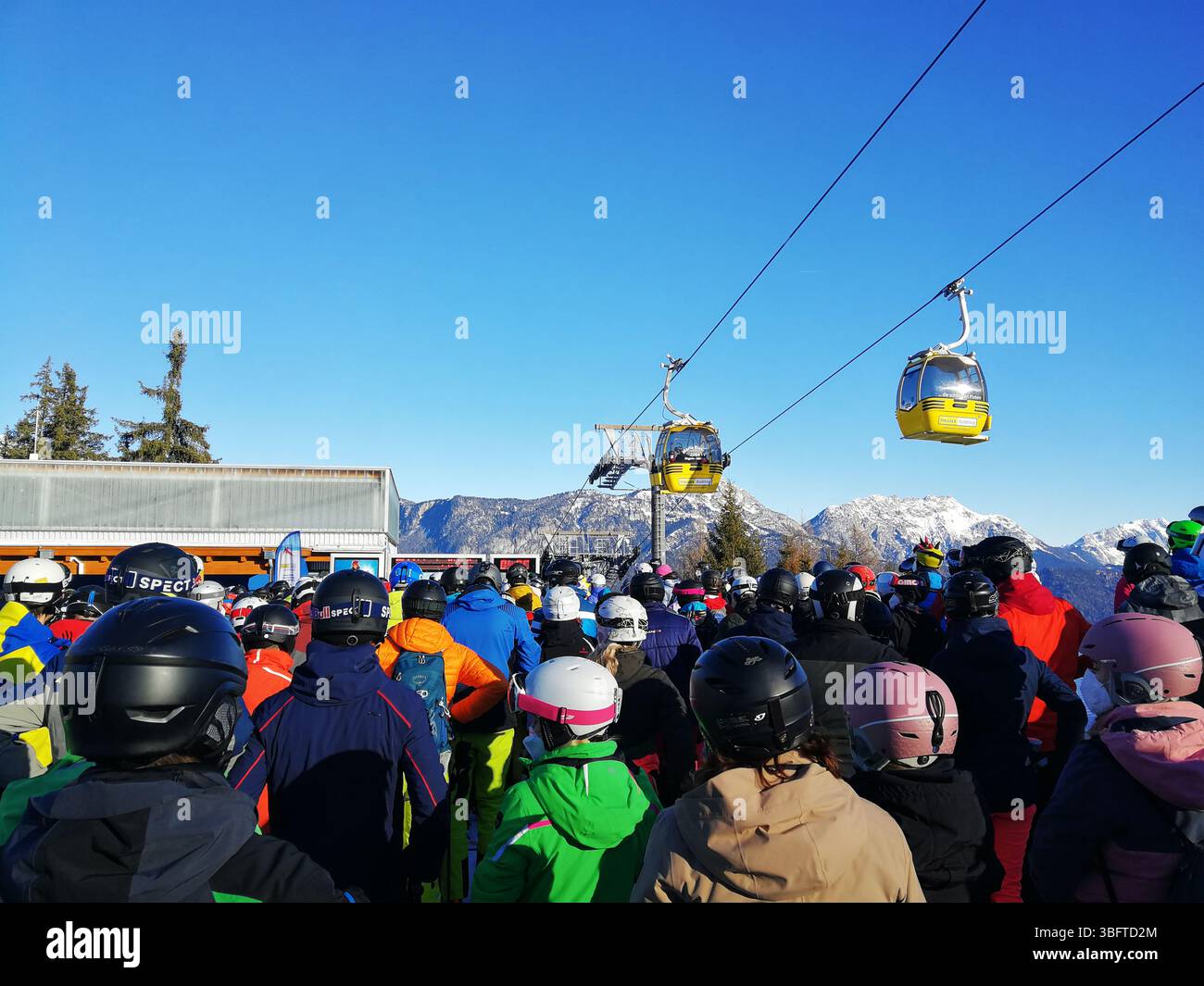 Crowded Ski Resort Line with Cable Cars on a Mountainous Landscape ...