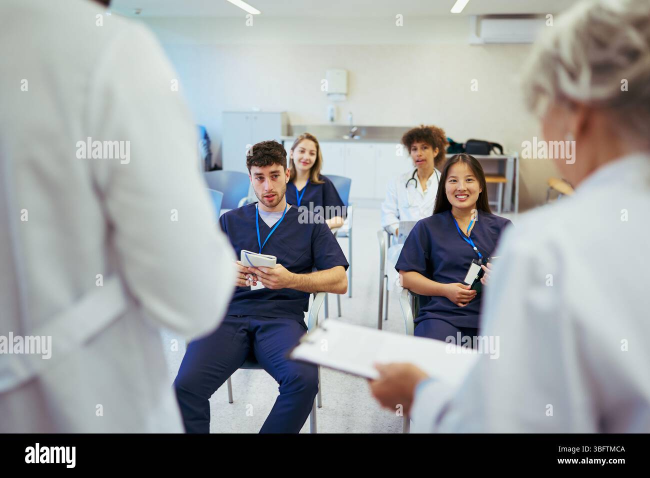 Medical team attending conference in modern hospital setting Stock ...