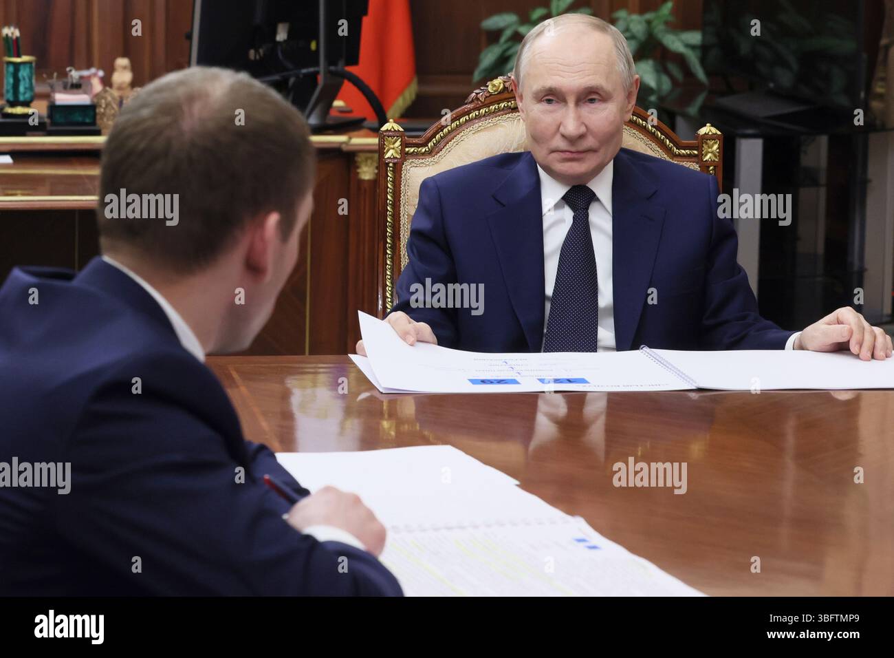 Russian President Vladimir Putin, right, speaks with Alexander Kozlov ...