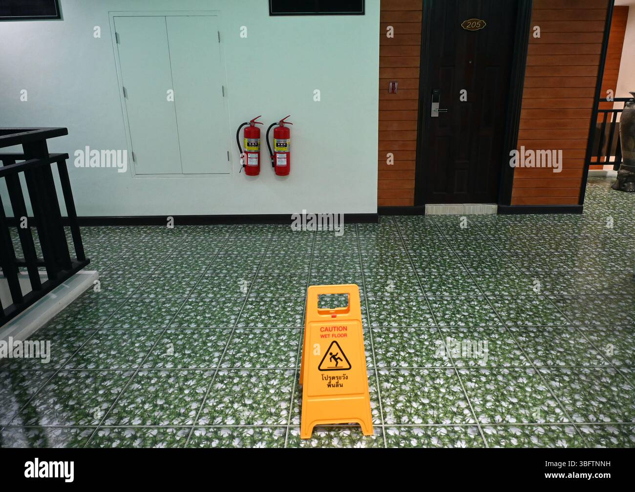 Caution wet floor sign on slippery tile floor in Thai hotel Stock Photo ...