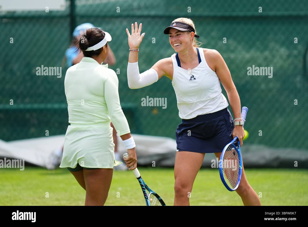 Emily Appleton and Heather Watson react during their women's doubles ...