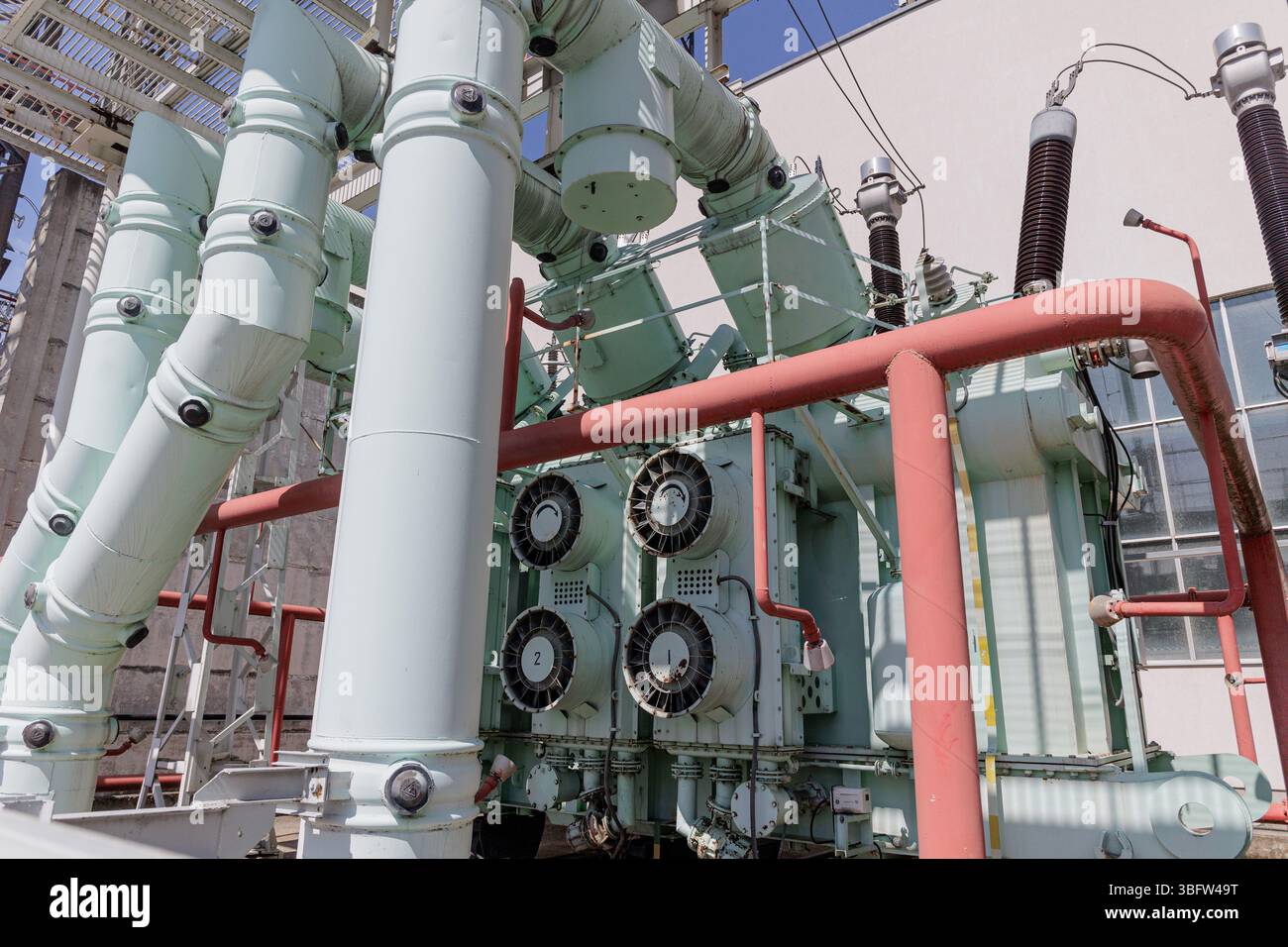 High-voltage industrial power transformer with cooling system and ...