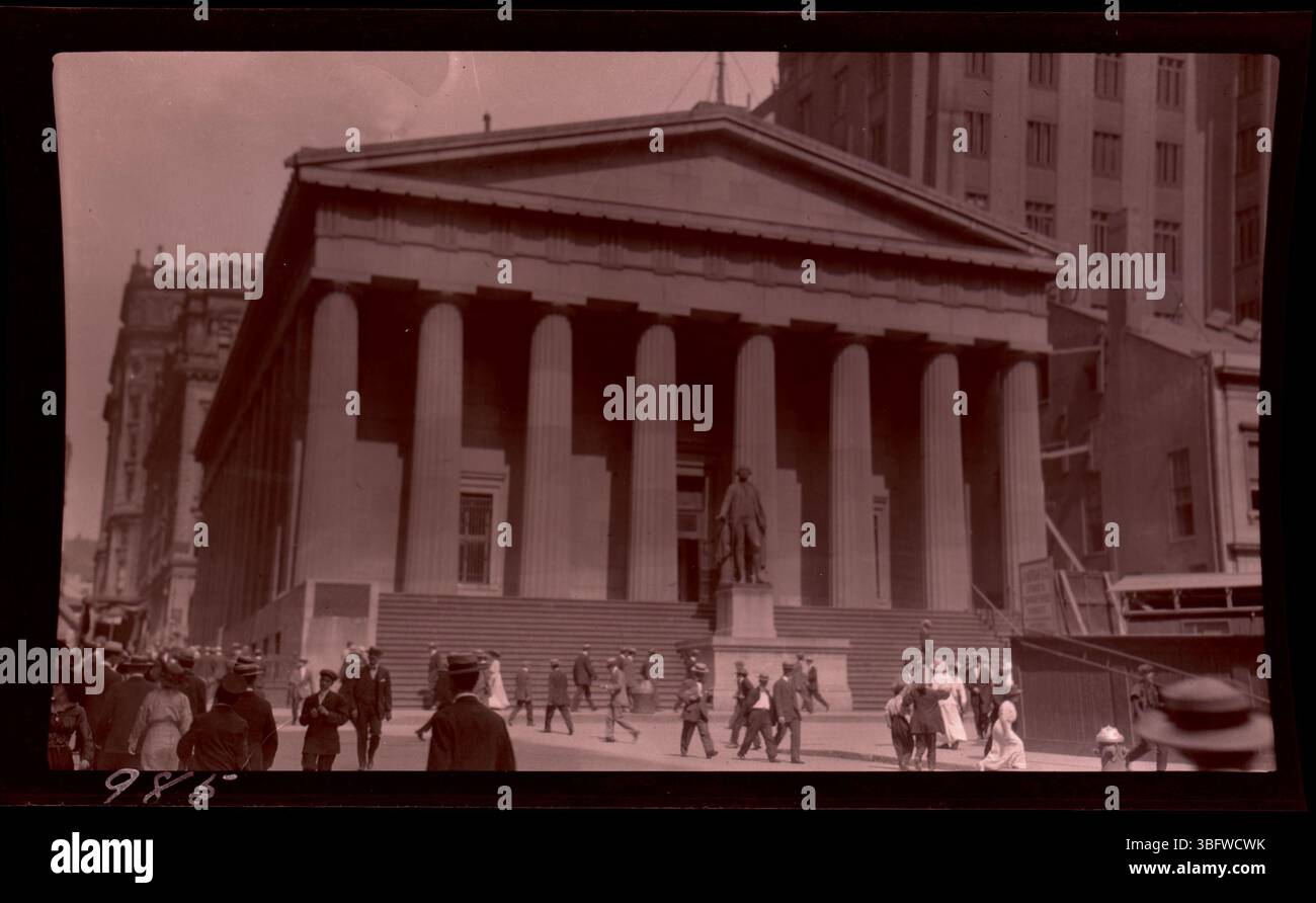 A 1913 photograph of pedestrians passing by the entrance to Federal ...