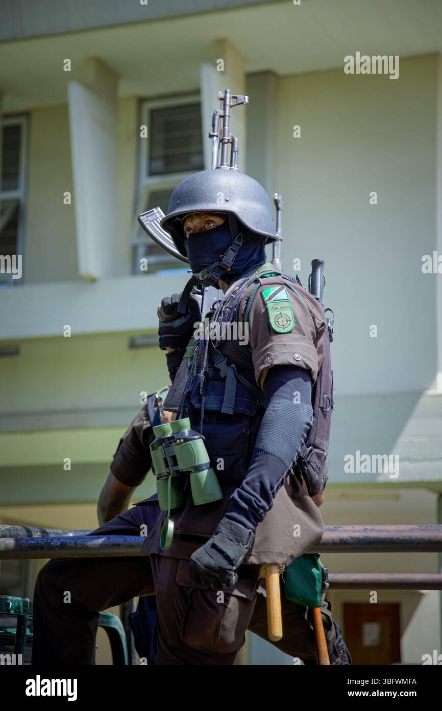 Tanzania police officer stands guarding at the Kisutu magistrate's ...
