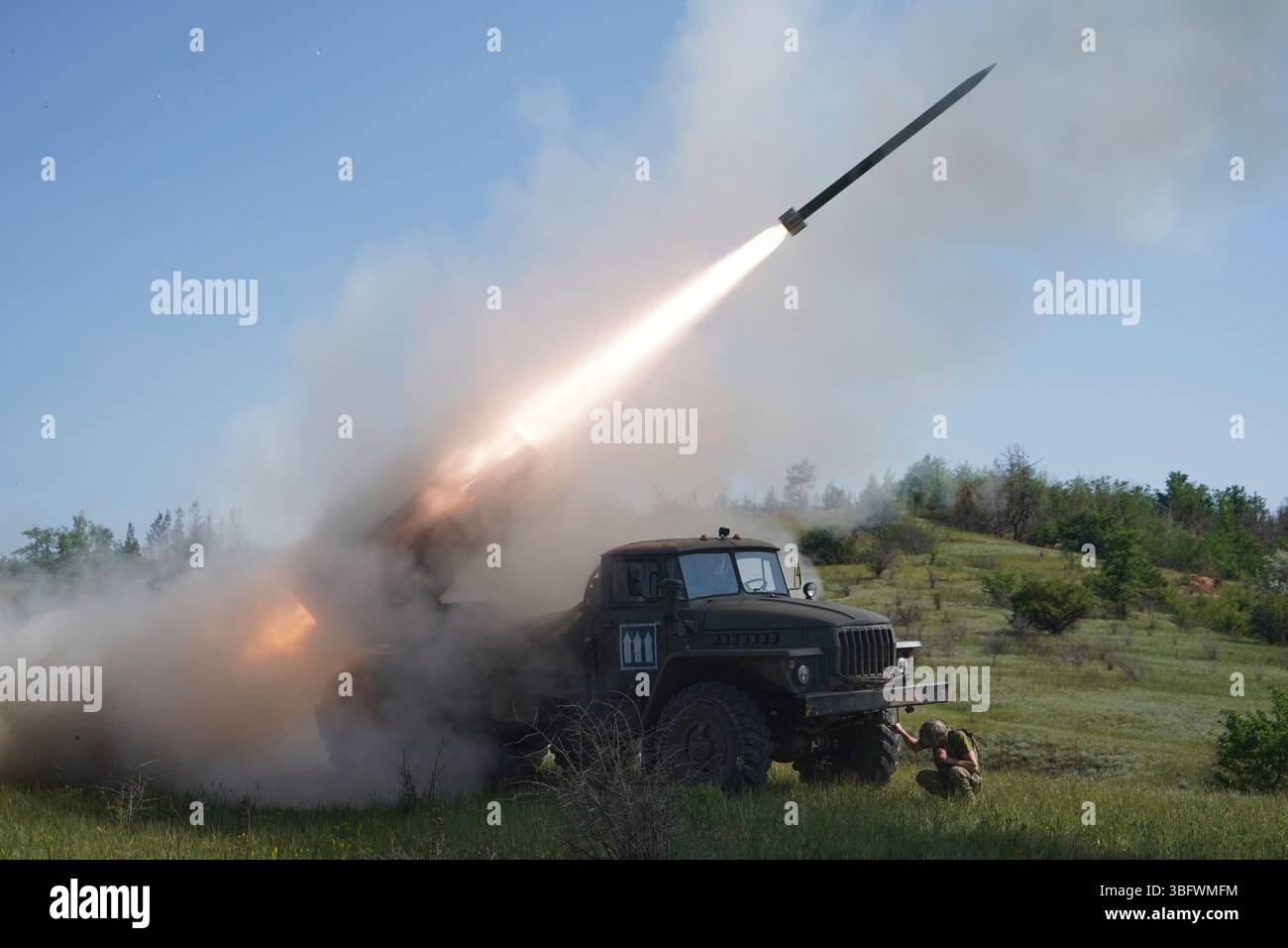 Soldiers of Ukraine's 30th Separate Mechanized Brigade fire a Grad ...