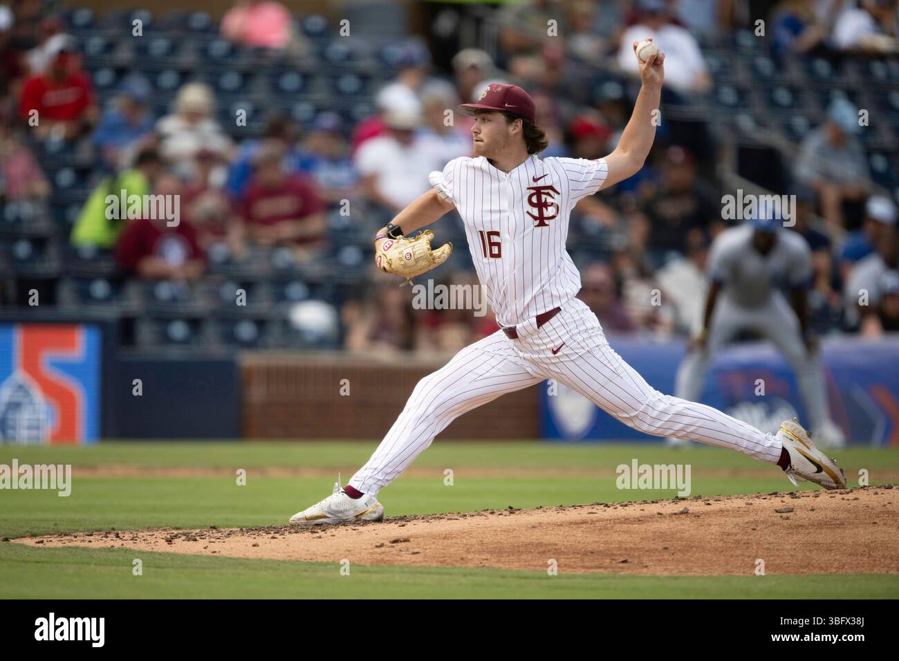 Jamie Arnold (16) of the Florida State Seminoles delivers a pitch to ...