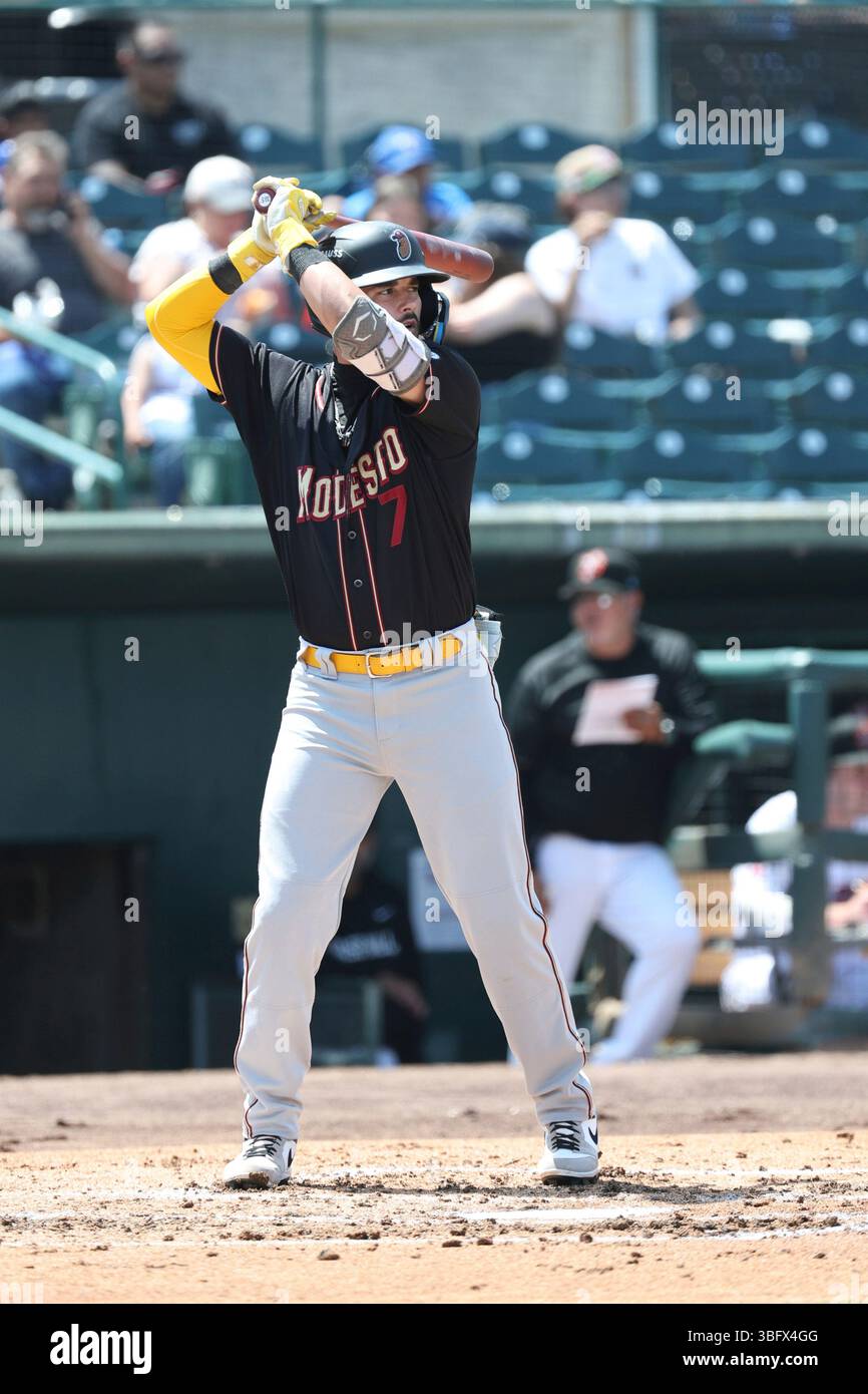 Austin St Laurent (7) of the Modesto Nuts bats against the Inland ...