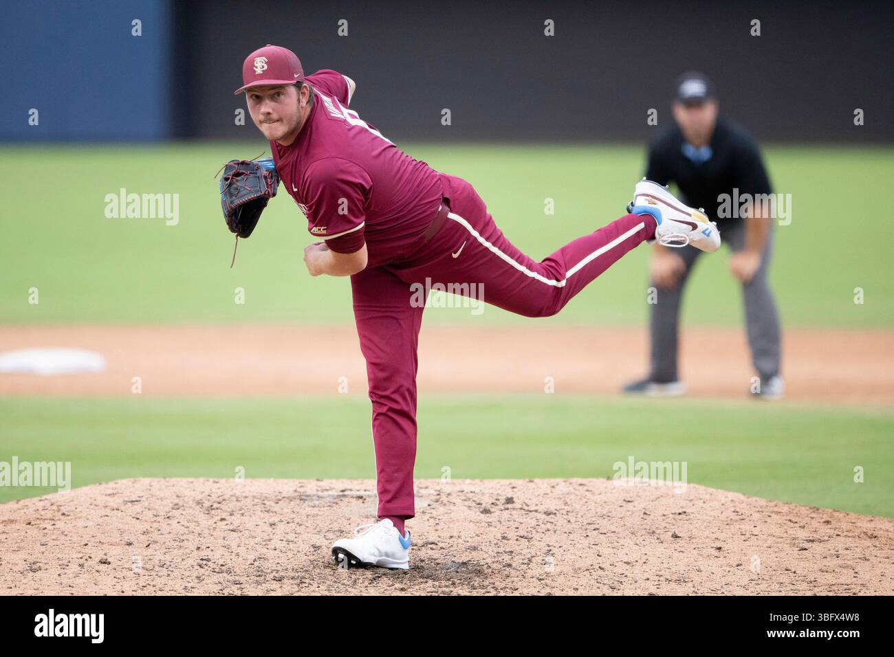 Pitcher Joey Volini (17) of the Florida State Seminoles delivers a ...