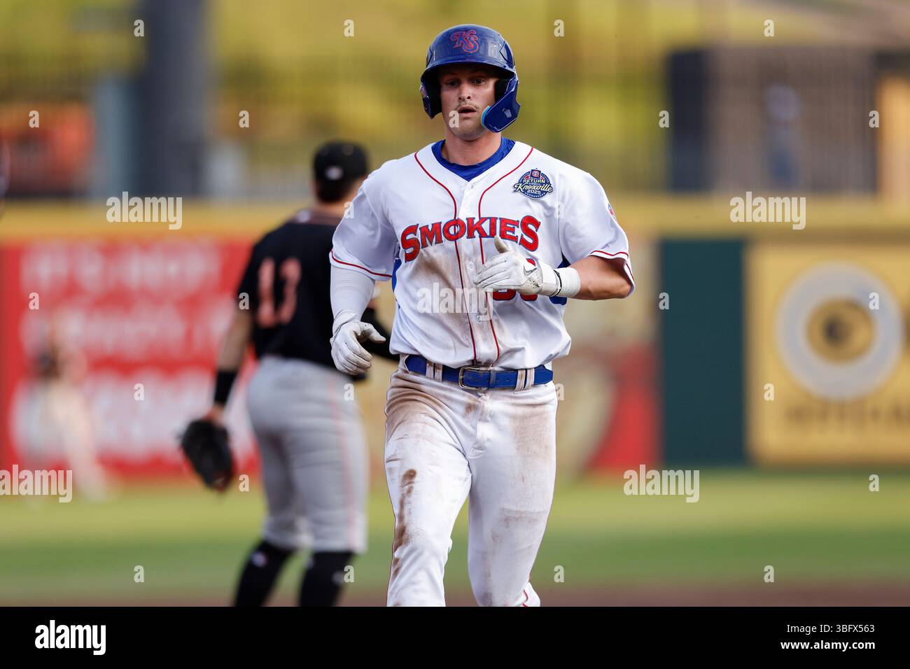 Knoxville Smokies second baseman Corey Joyce (39) hustles to third base ...