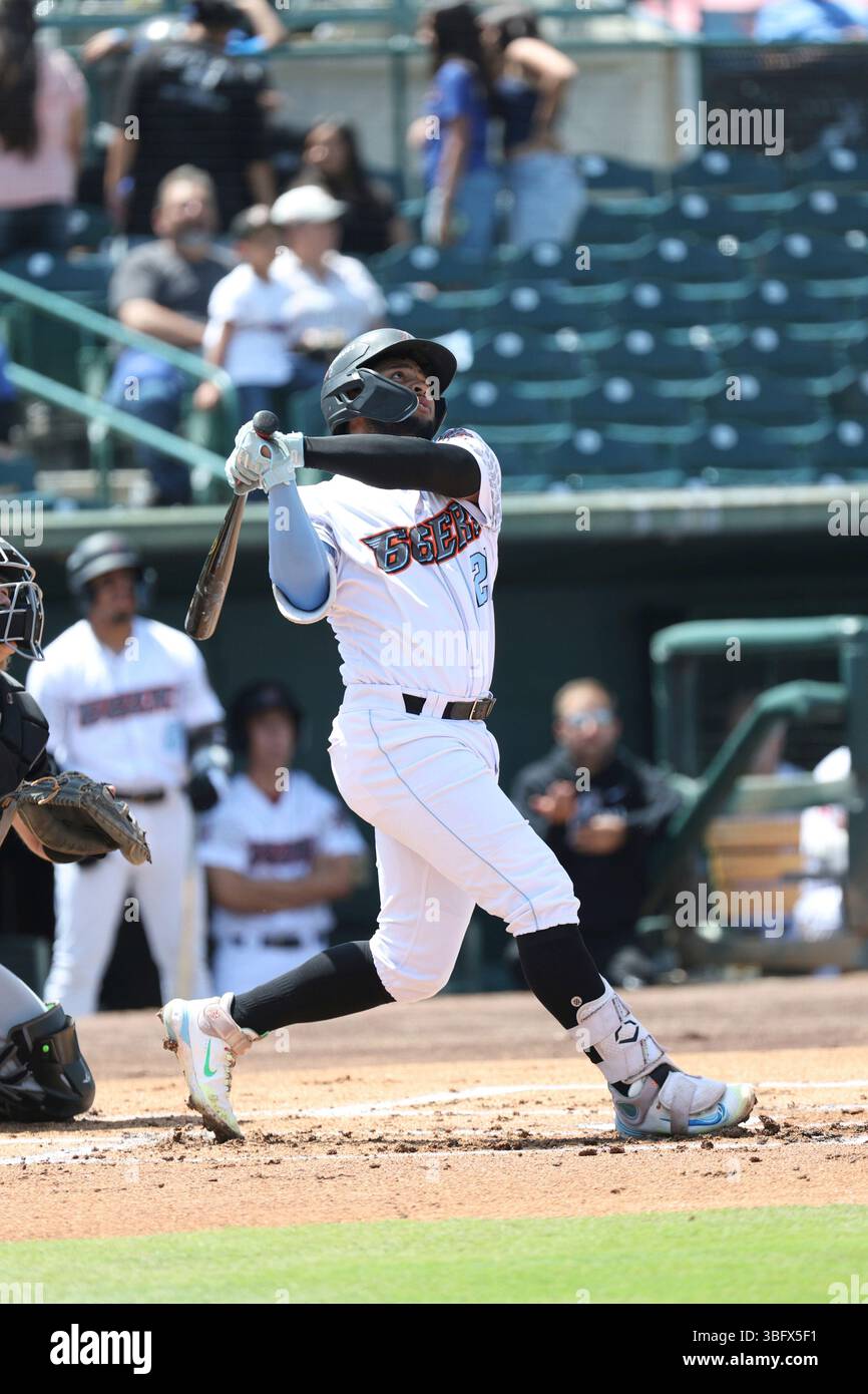 Dario Laverde (21) of the Inland Empire 66ers bats against the Modesto ...