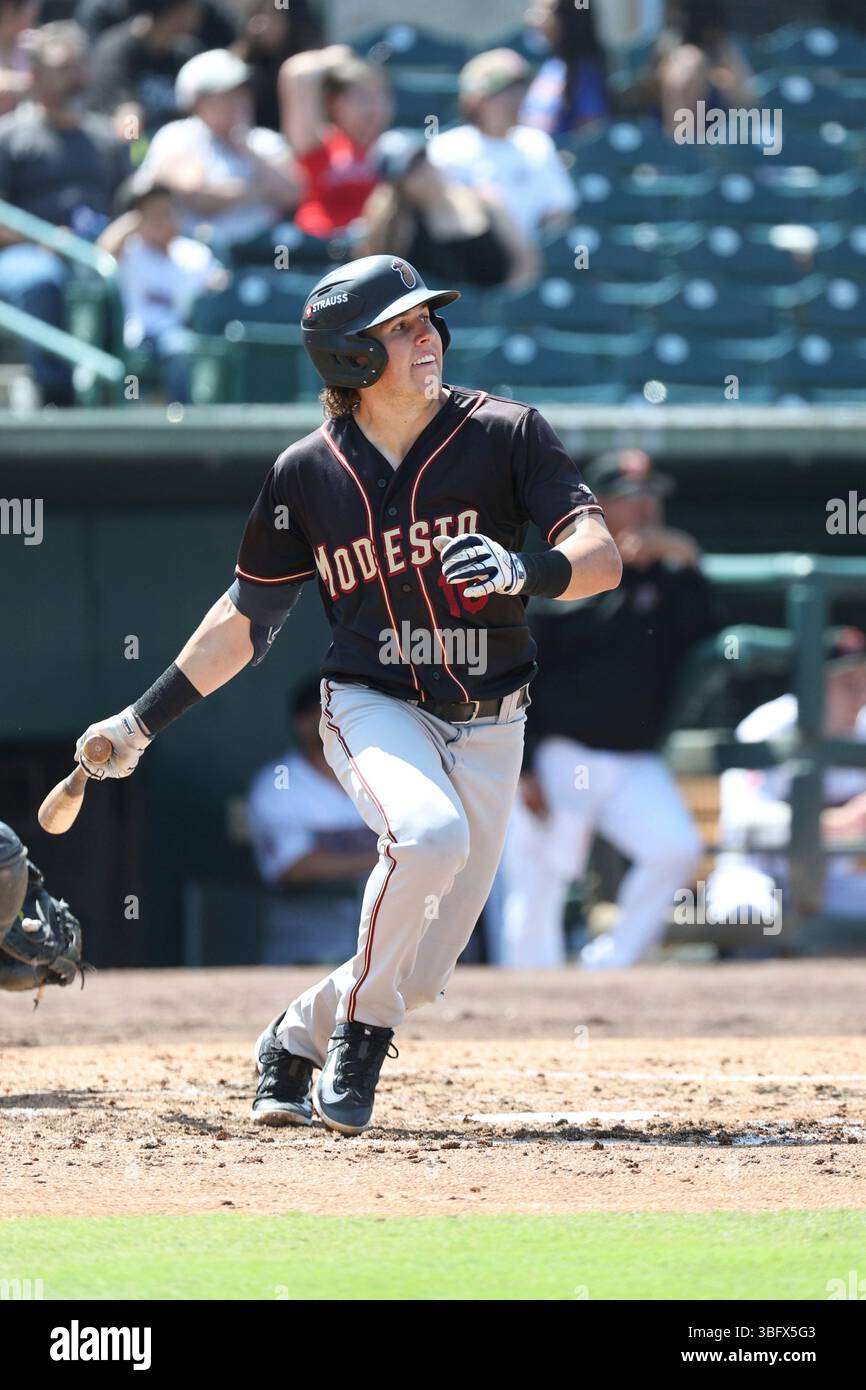 Carter Dorighi (10) of the Modesto Nuts bats against the Inland Empire ...