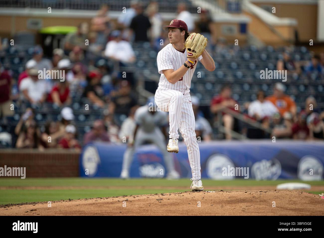 Jamie Arnold (16) of the Florida State Seminoles delivers a pitch to ...