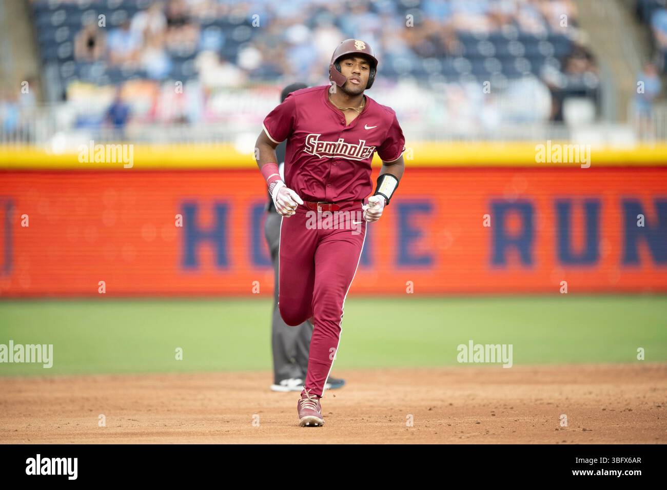 Myles Bailey (12) of the Florida State Seminoles rounds the bases after ...