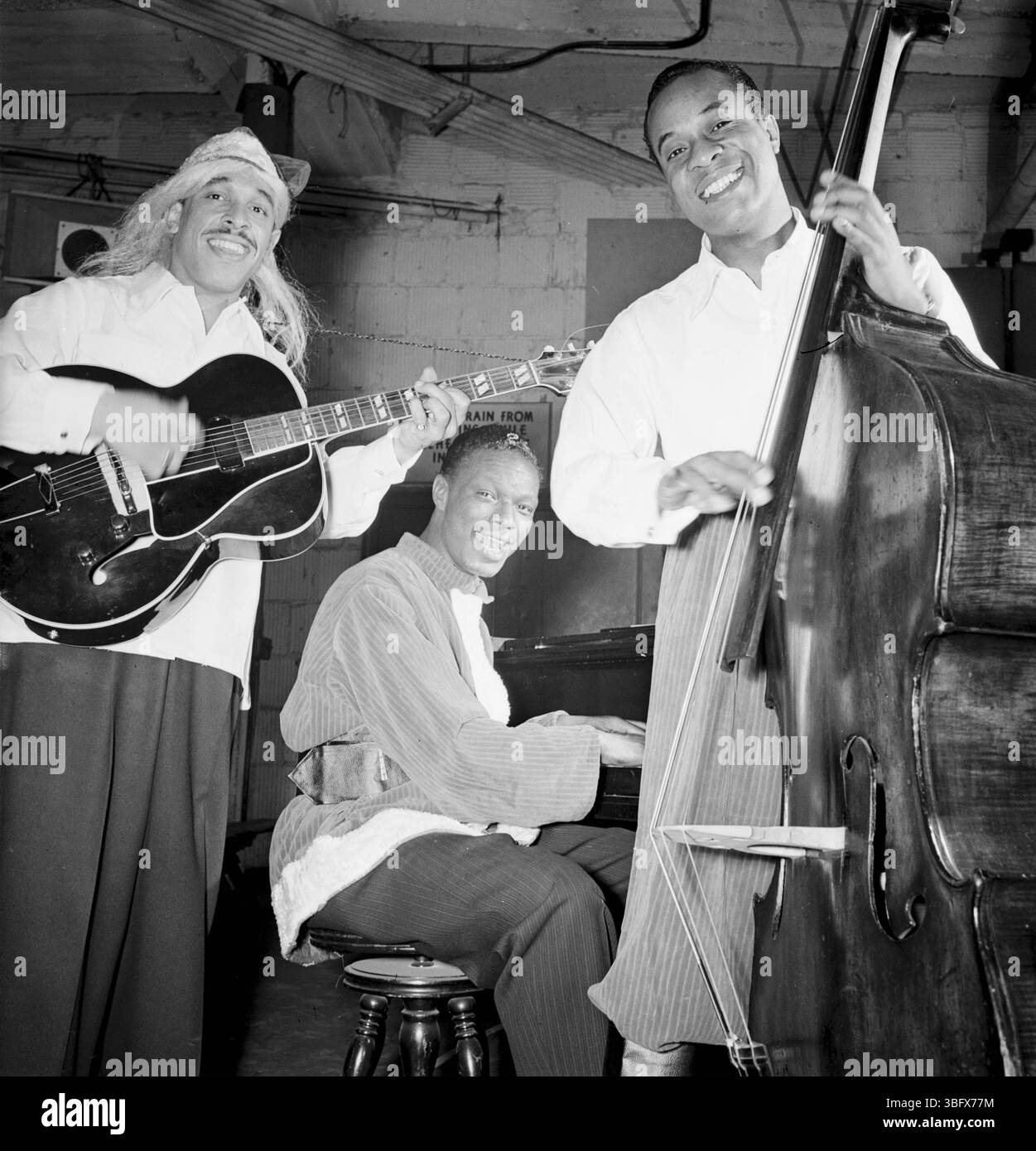 Oscar Moore, Nat King Cole, and Wesley Prince, New York, in July 1946 ...