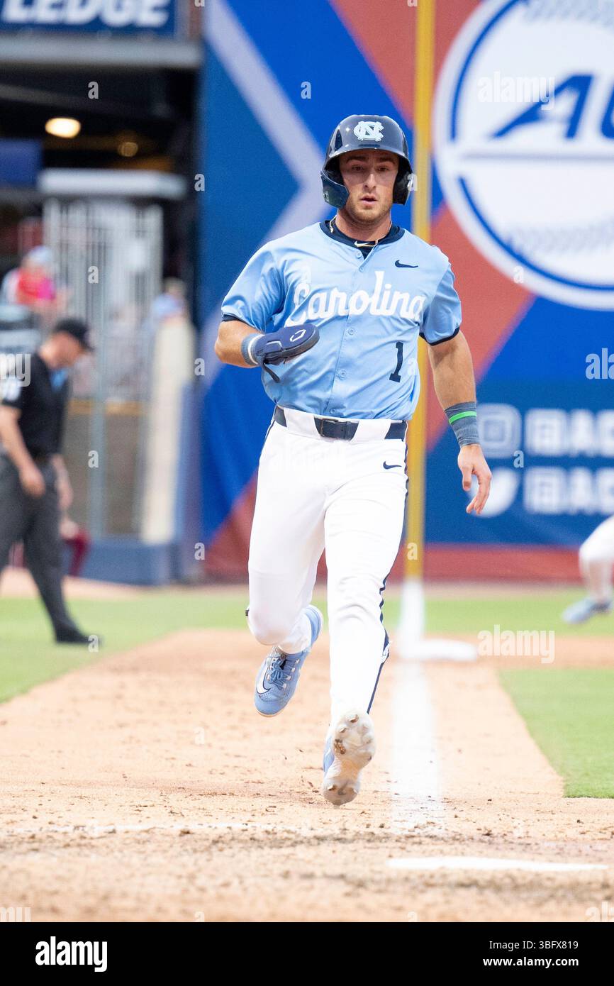 Alex Madera (1) of the University of North Carolina Tar Heels crosses ...