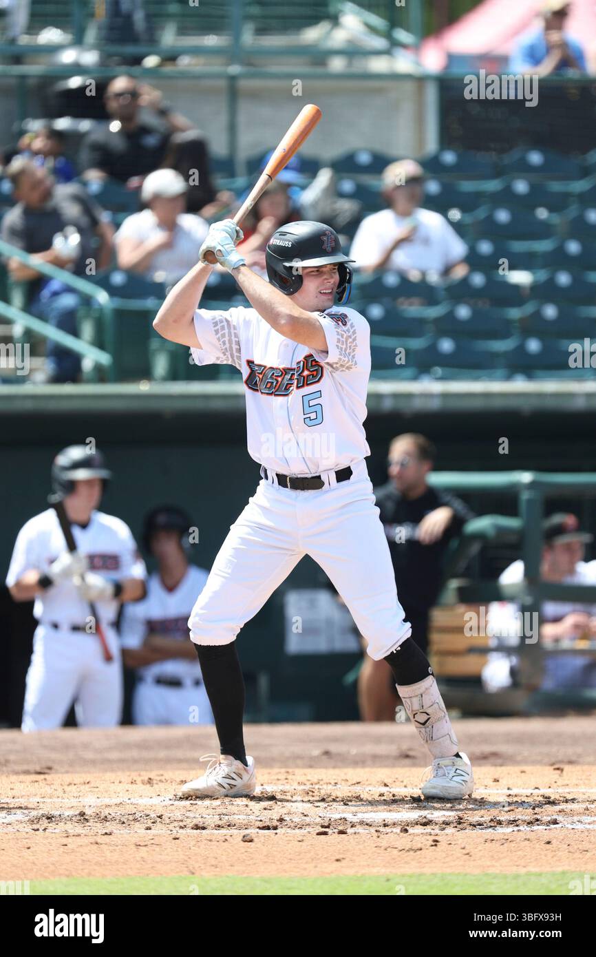 John Wimmer (5) of the Inland Empire 66ers bats against the Modesto ...