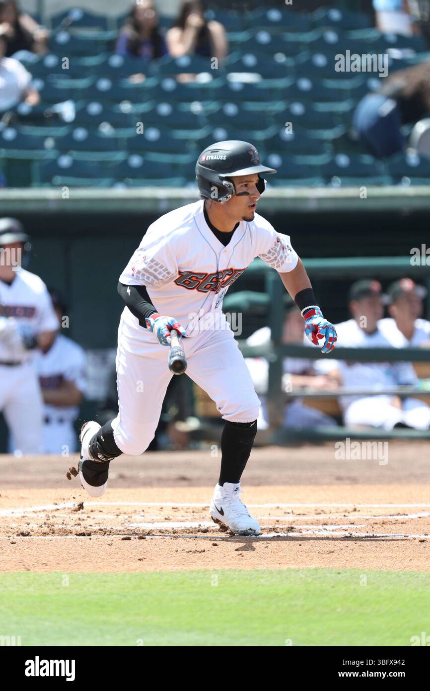 Johan Macias (4) of the Inland Empire 66ers runs to first base against ...