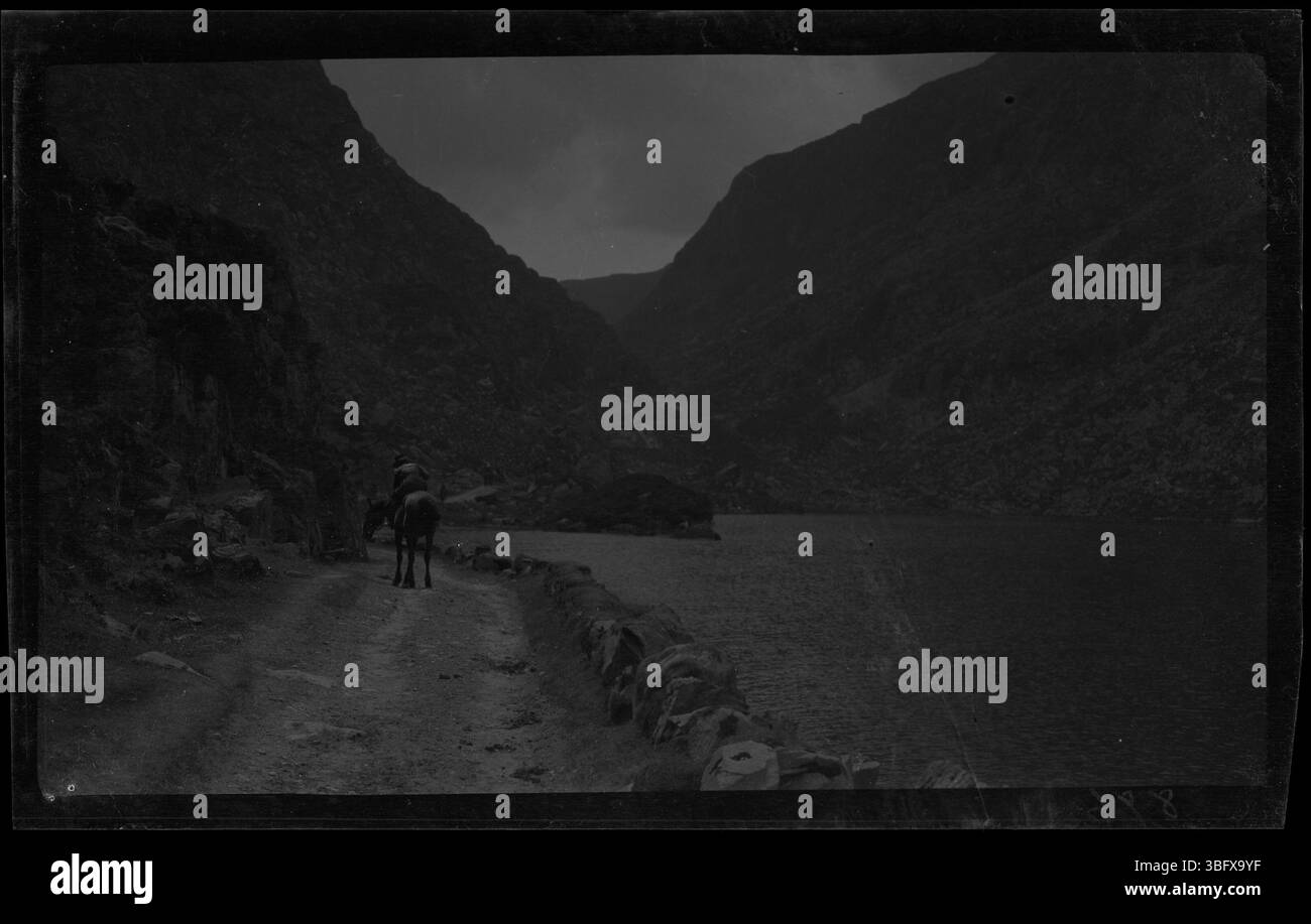 Elizabeth Arras, bending over her horse, captured at Auger Lake in ...