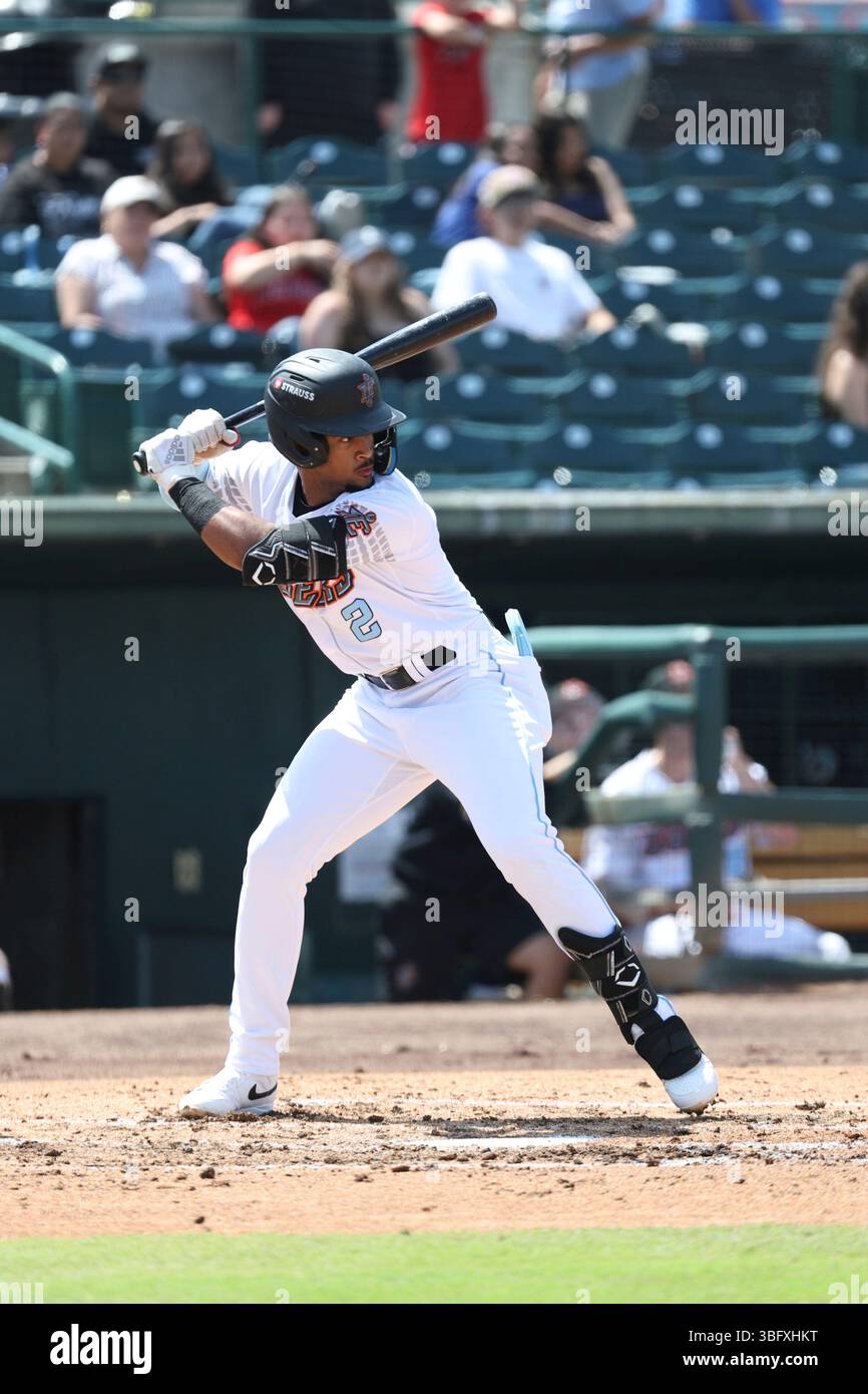 Edwardo Espinal (2) of the Inland Empire 66ers bats against the Modesto Nuts at San Manual ...