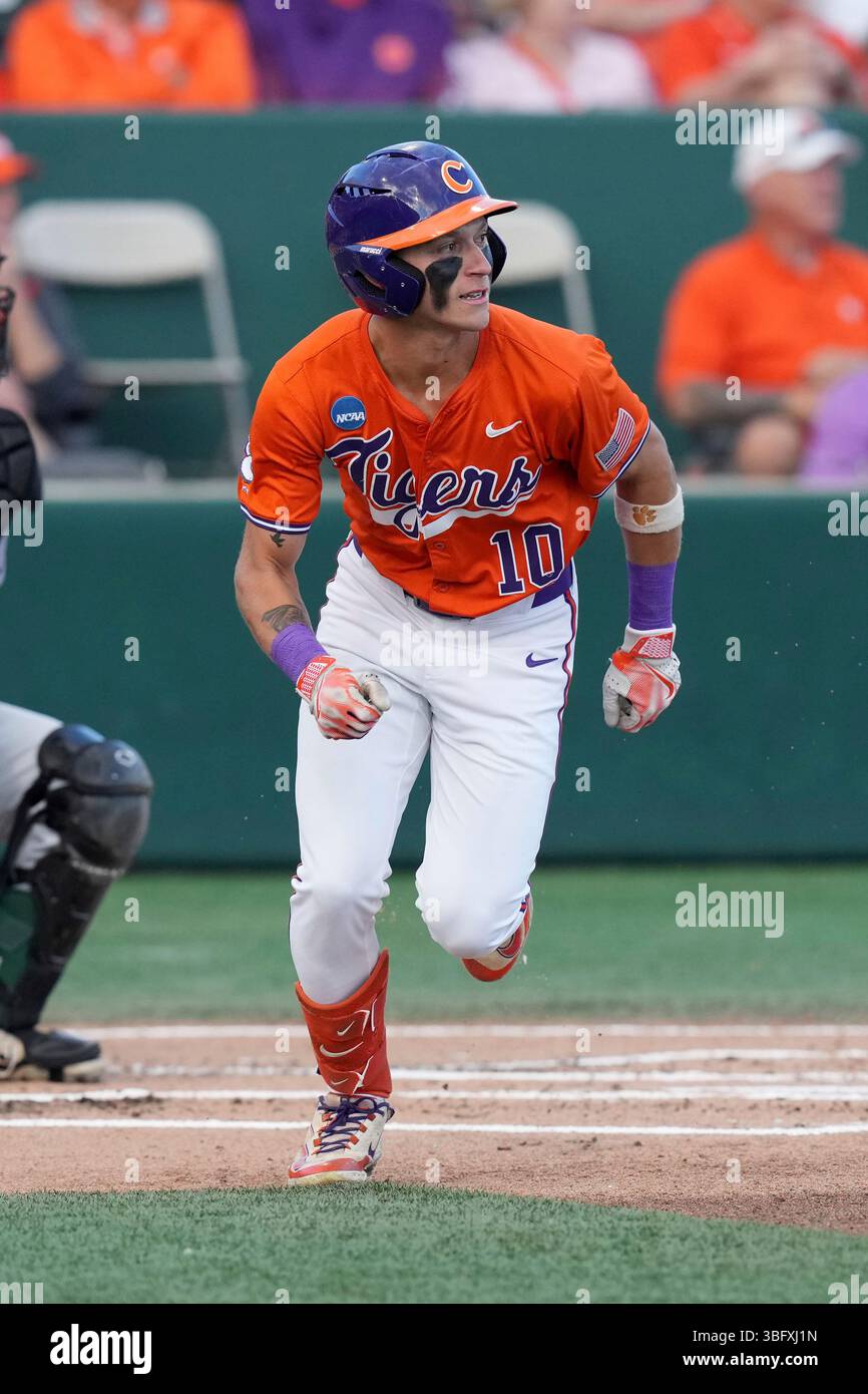 Cam Cannarella (10) of the Clemson Tigers runs toward first base in an ...