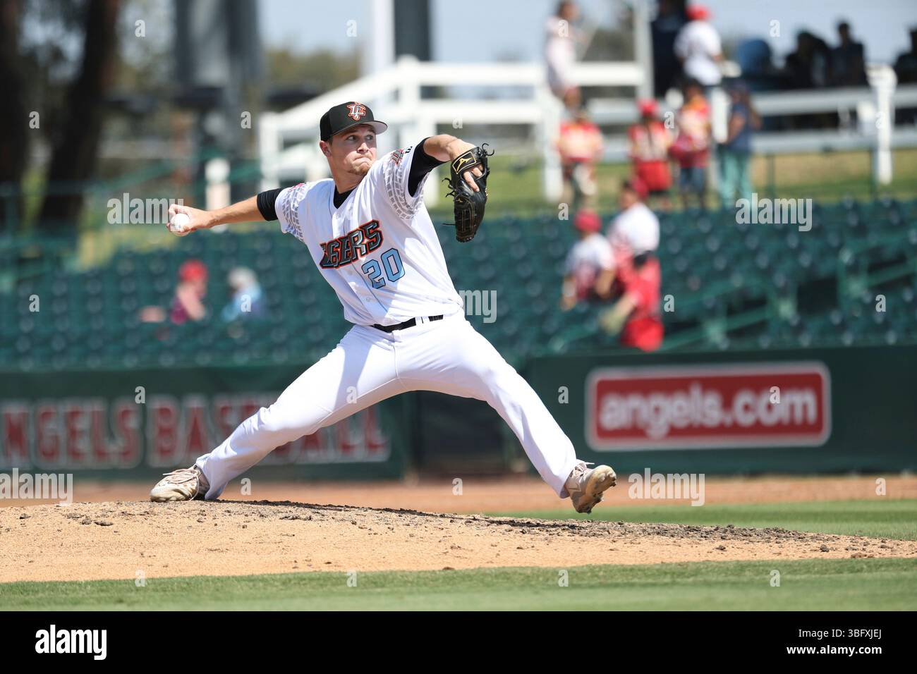 Kyle Roche (20) of the Inland Empire 66ers pitches against the Modesto ...