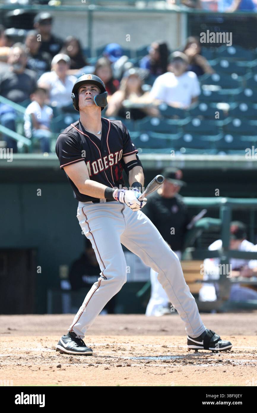 Ryan Picollo (17) of the Modesto Nuts bats against the Inland Empire ...