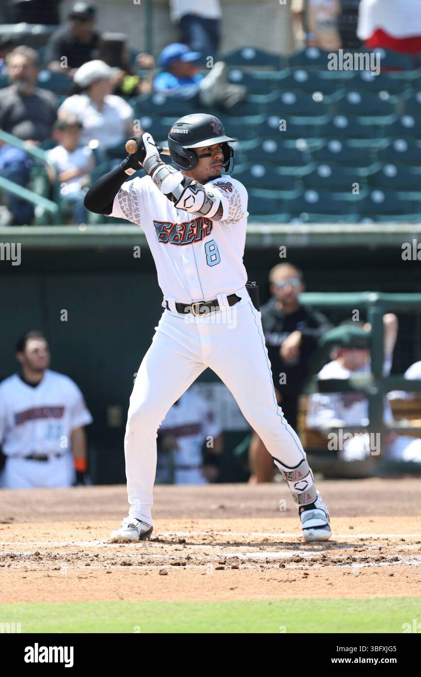 Harold Coll (8) of the Inland Empire 66ers bats against the Modesto ...