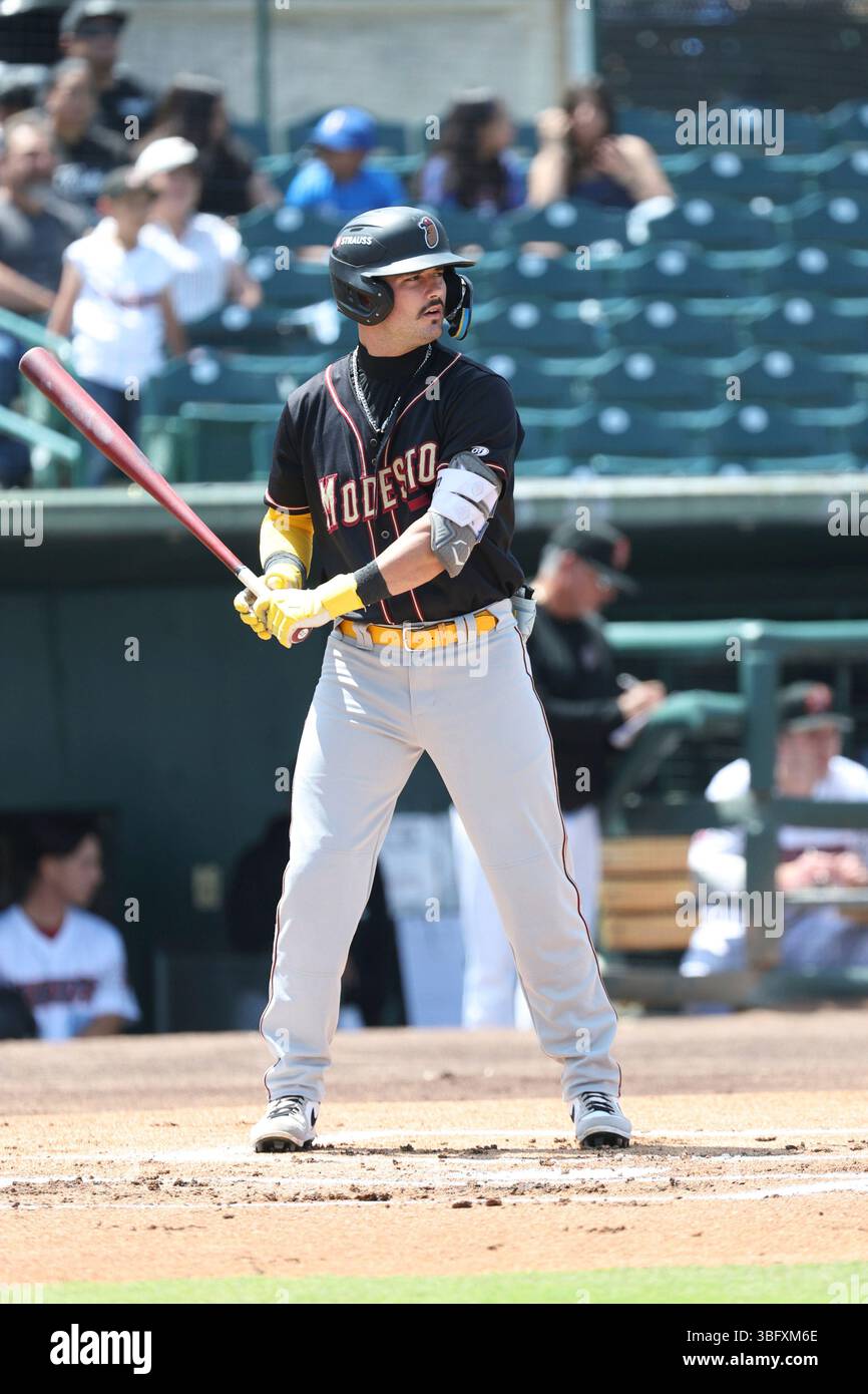 Austin St Laurent (7) of the Modesto Nuts bats against the Inland ...