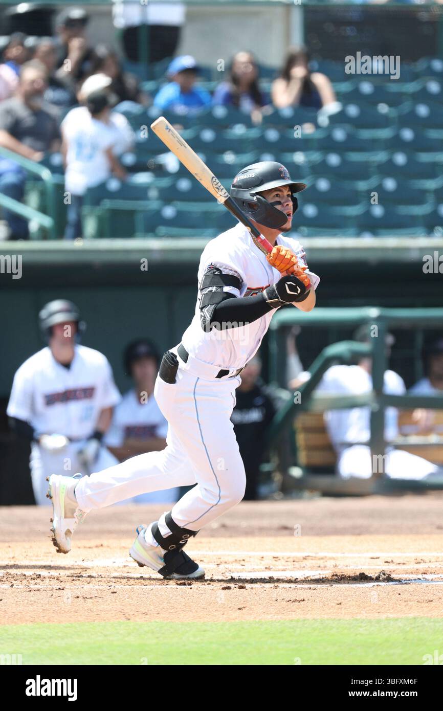 Jorge Ruiz (3) of the Inland Empire 66ers bats against the Modesto Nuts ...